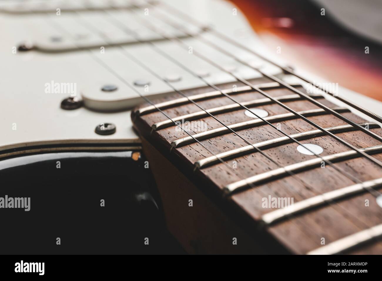 Modern bass guitar, closeup view Stock Photo - Alamy