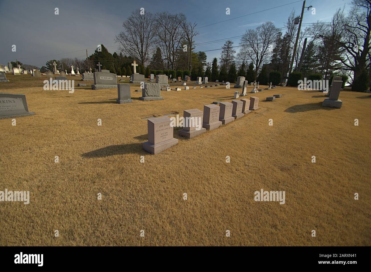 graveyard in winter with dormant grass Stock Photo - Alamy
