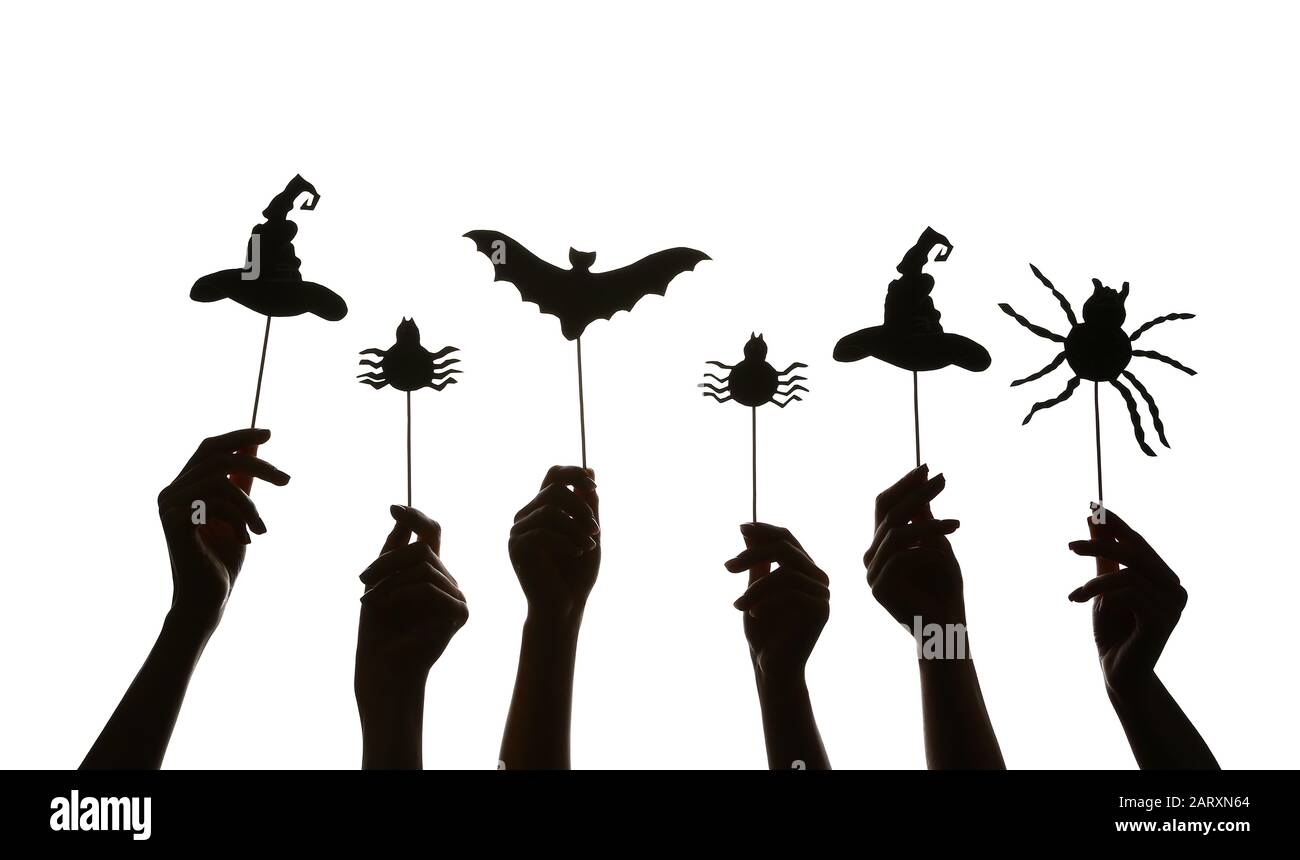 Silhouette of hands with Halloween decor on white background Stock ...