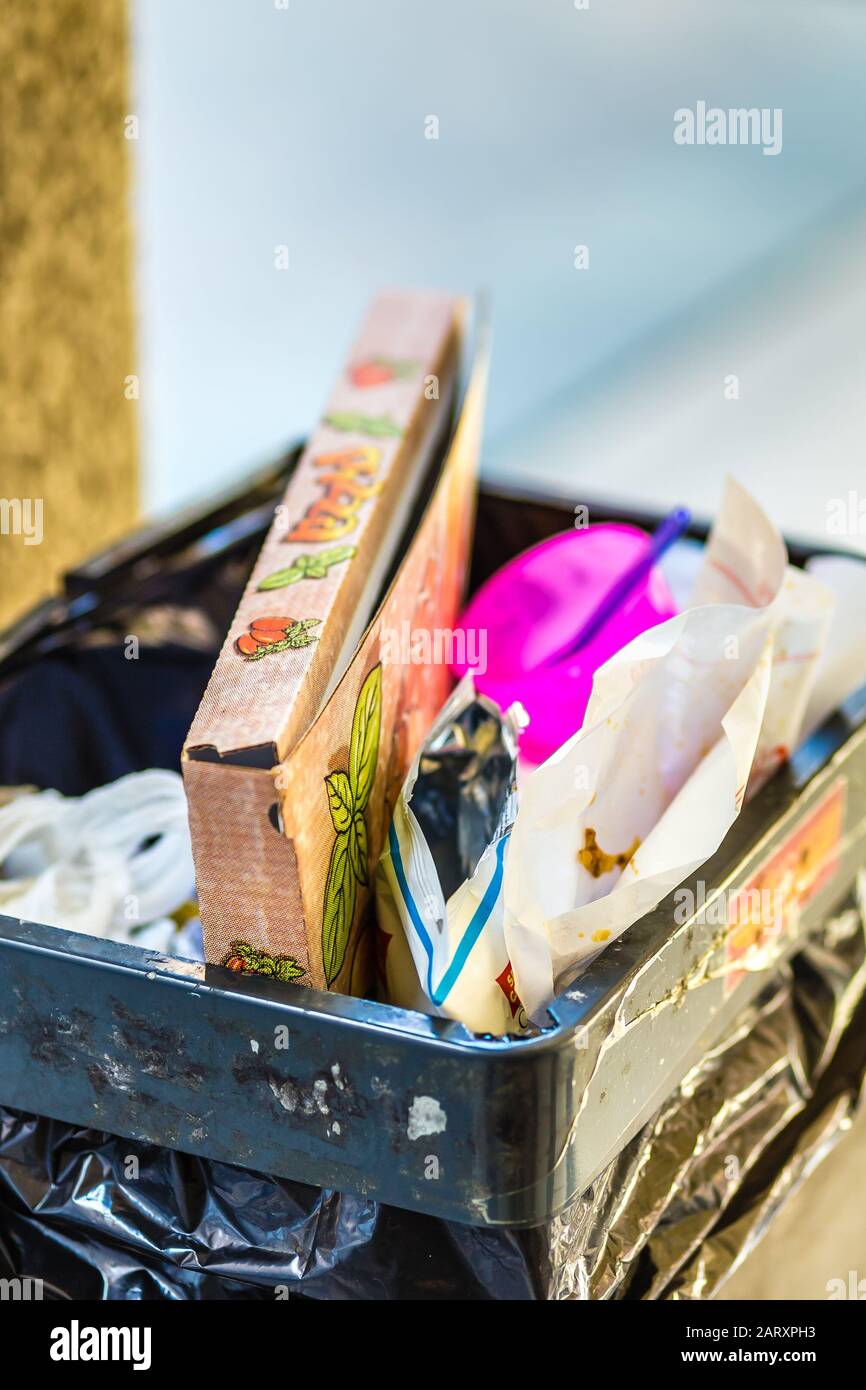 closeup of trash bin full of garbage Stock Photo - Alamy