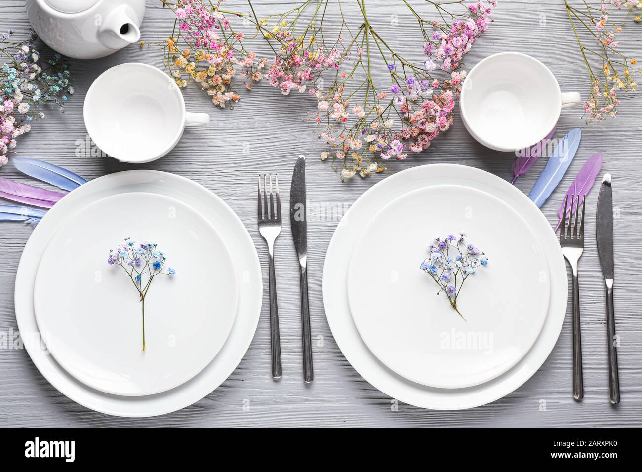 Beautiful table setting on wooden background Stock Photo - Alamy