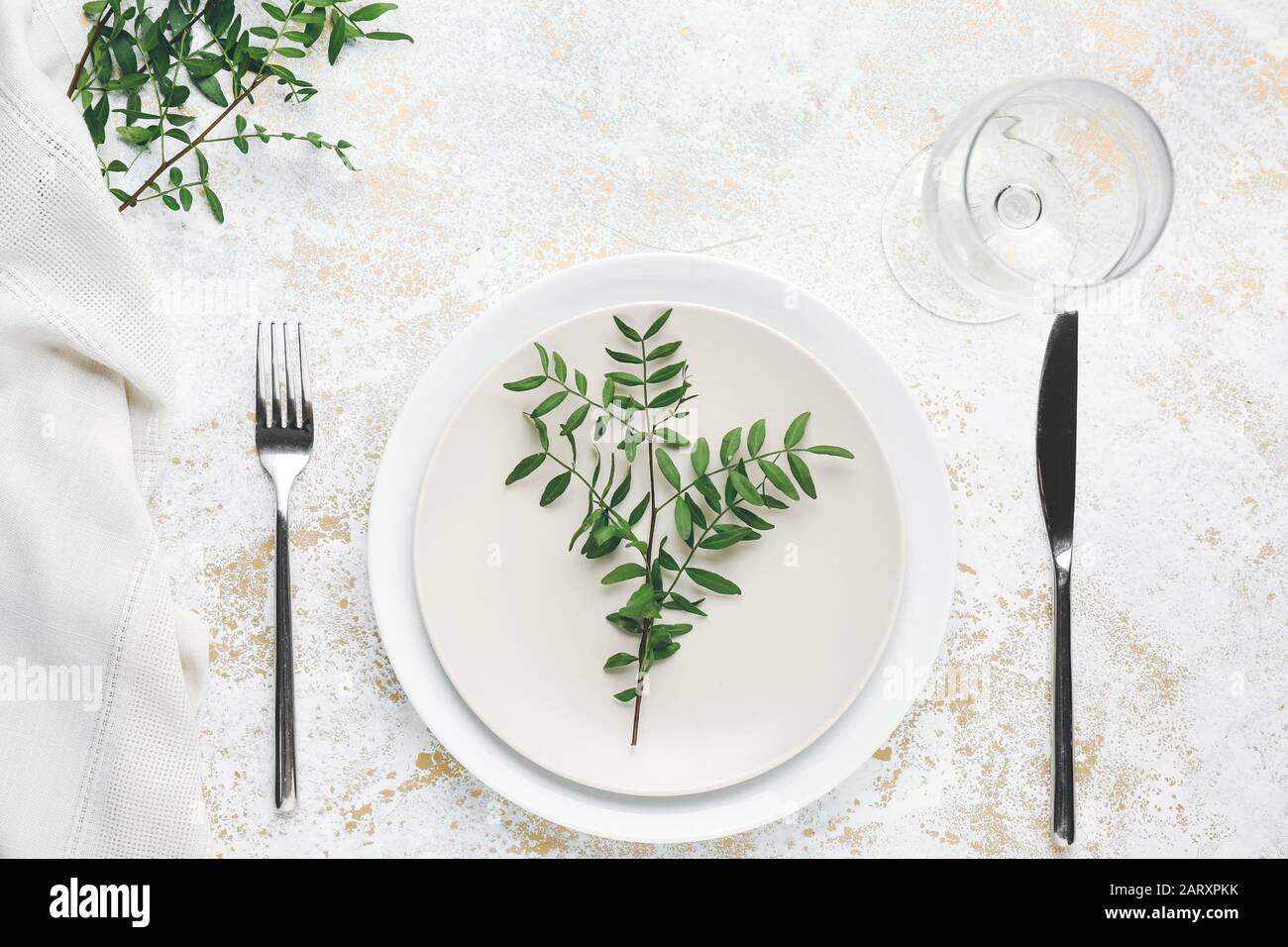 Beautiful table setting with eucalyptus on white background Stock Photo ...