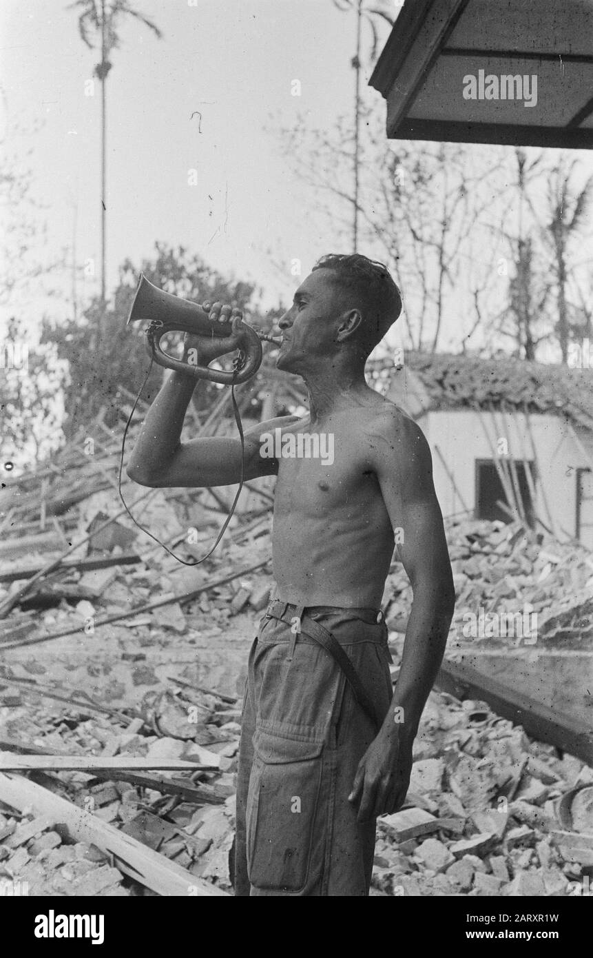 [Trumpet plays his instrument at a destroyed building] Date: 1946 ...