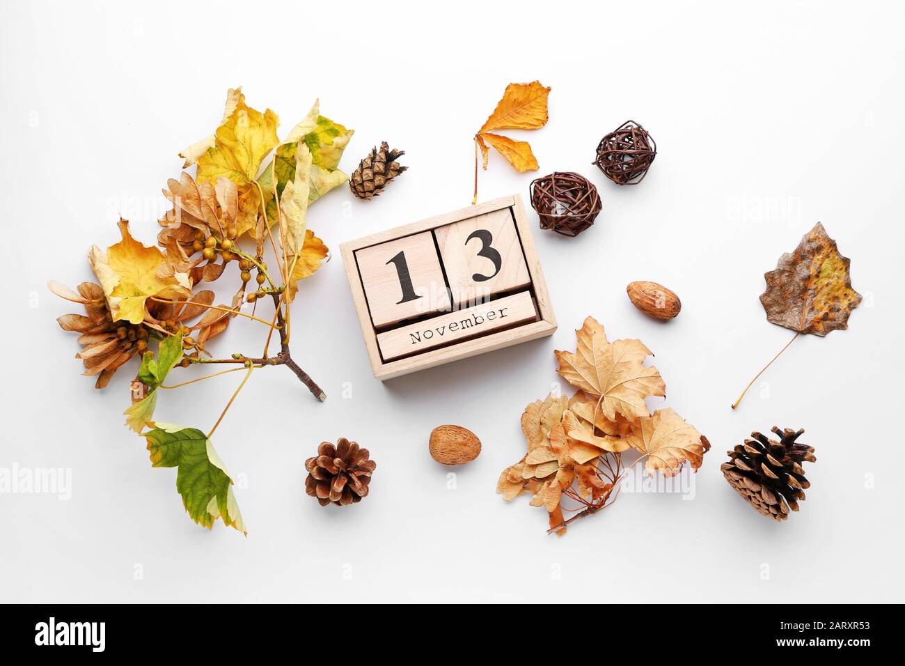 Composition with autumn leaves and calendar on white background Stock ...