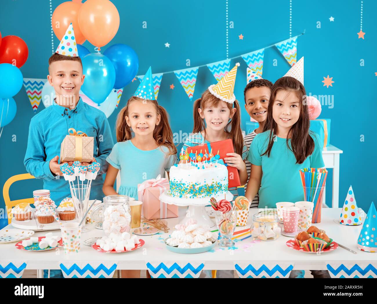 Little children celebrating Birthday at home Stock Photo - Alamy