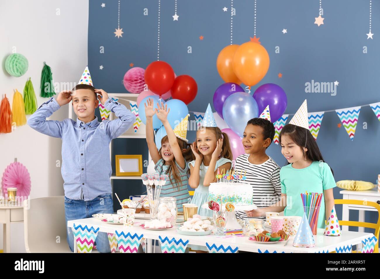 Little children celebrating Birthday at home Stock Photo - Alamy