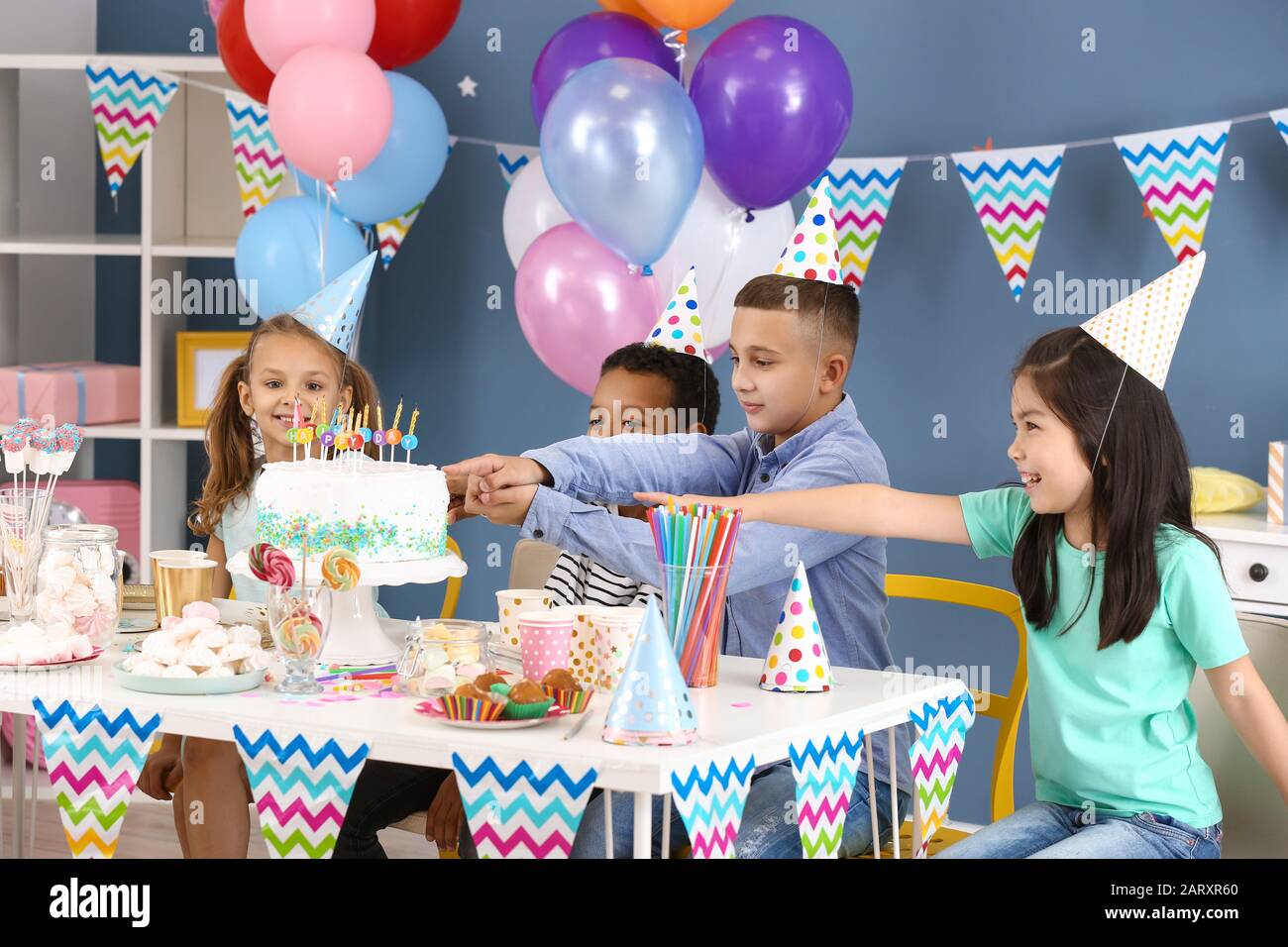 Little children celebrating Birthday at home Stock Photo - Alamy