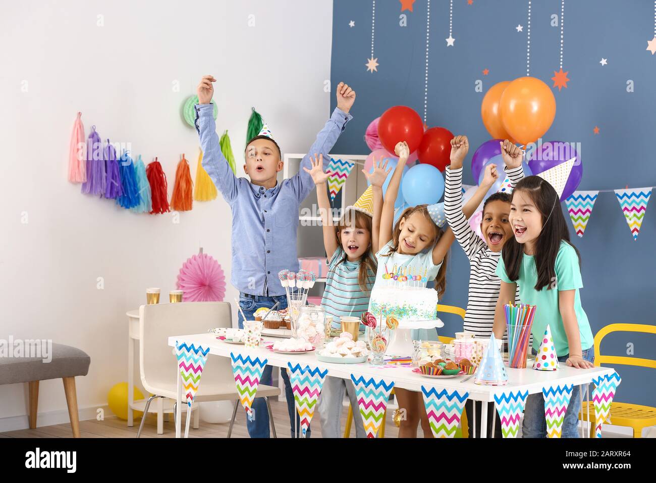 Little children celebrating Birthday at home Stock Photo - Alamy