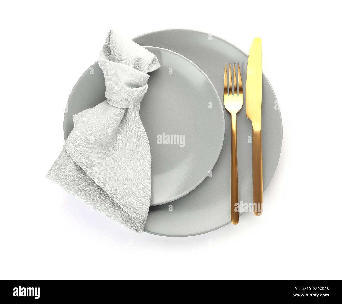 Beautiful table setting on white background Stock Photo - Alamy