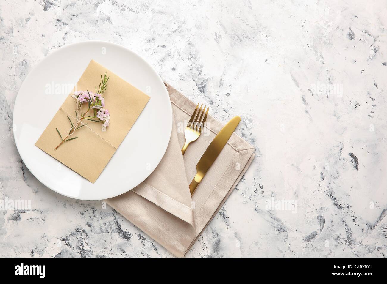 Beautiful table setting on light background Stock Photo - Alamy