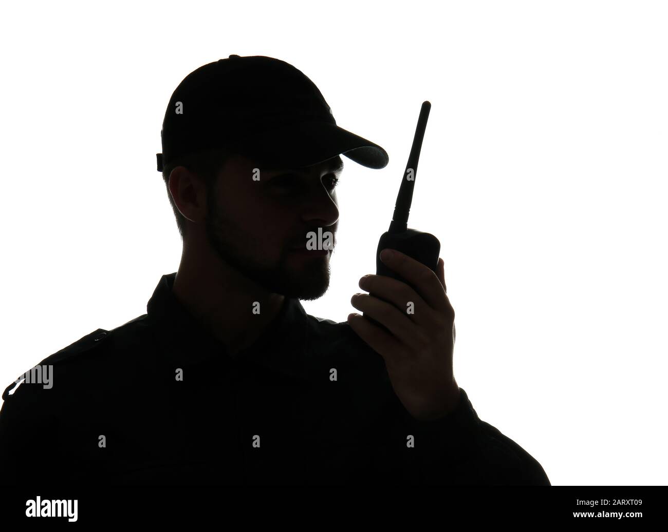 Silhouette of male security guard on white background Stock Photo - Alamy