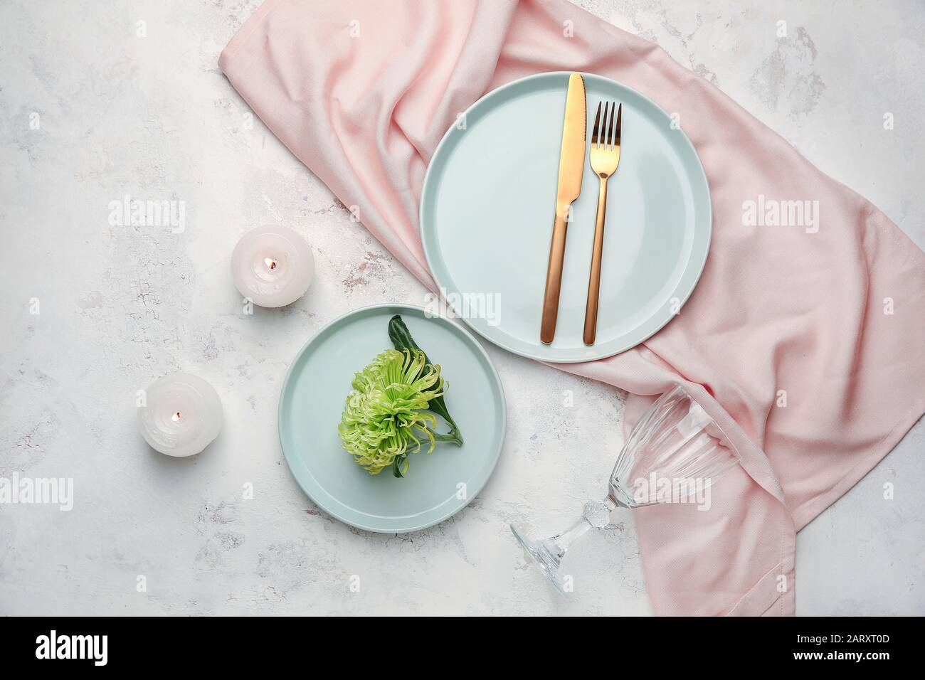 Beautiful table setting on light background Stock Photo - Alamy