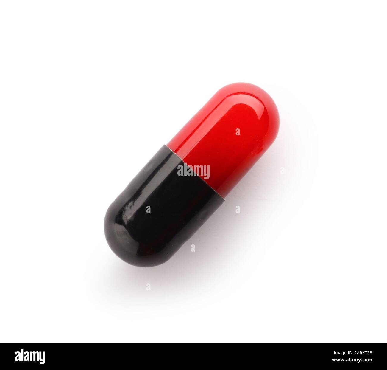 Color pill on white background Stock Photo - Alamy
