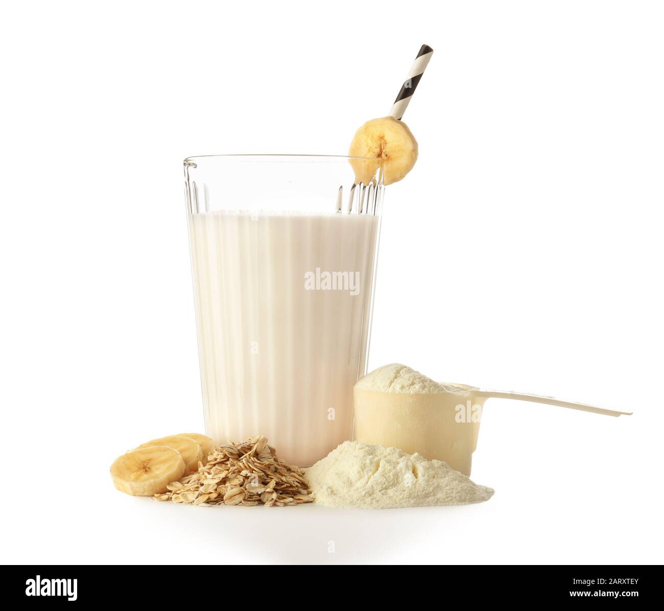 Glass of protein shake on white background Stock Photo - Alamy