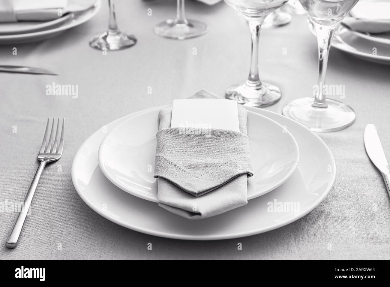 Beautiful simple table setting in cafe Stock Photo - Alamy