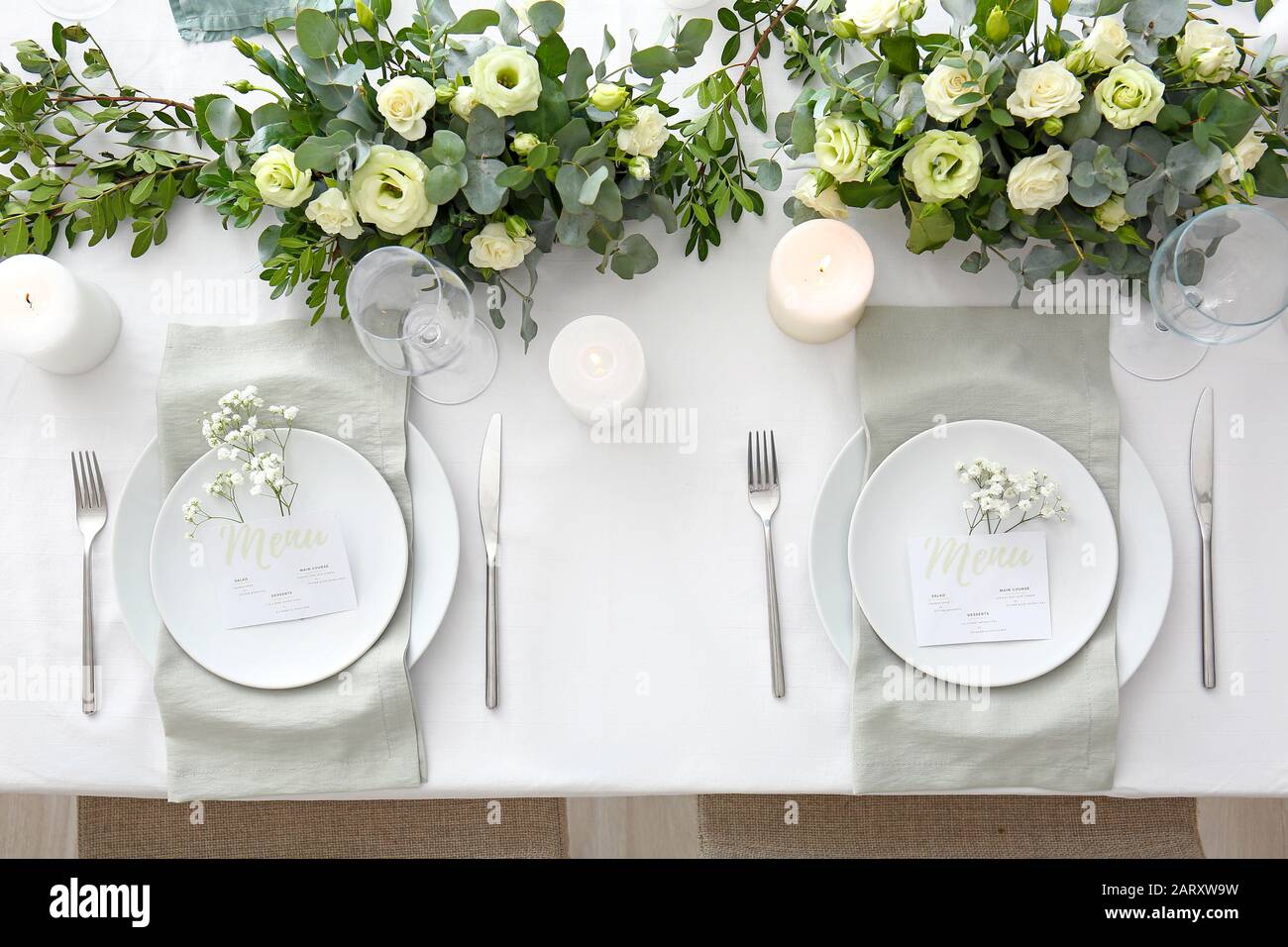 Beautiful table setting with floral decor Stock Photo - Alamy