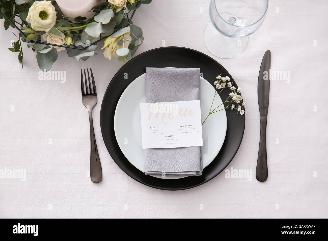 Beautiful table setting with floral decor Stock Photo - Alamy