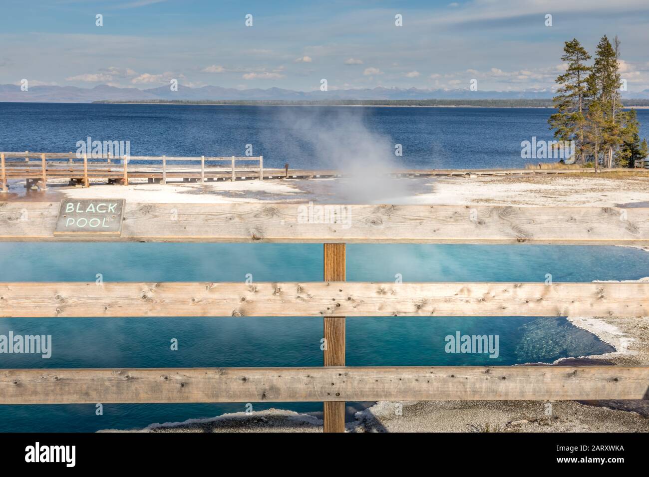 Railing around the Black Pool at Yellowstone National Park Stock Photo ...
