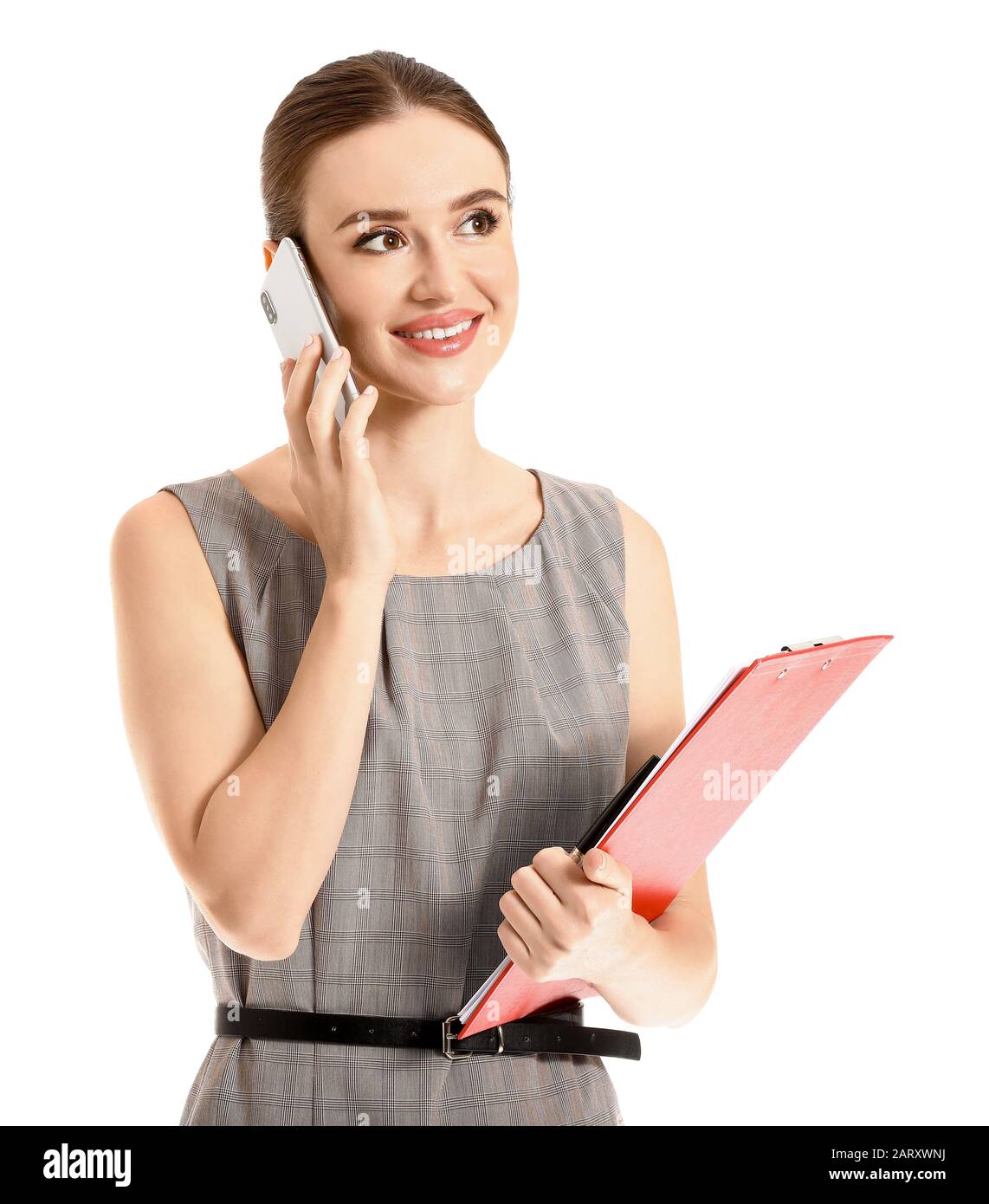 Female real estate agent talking by mobile phone on white background ...