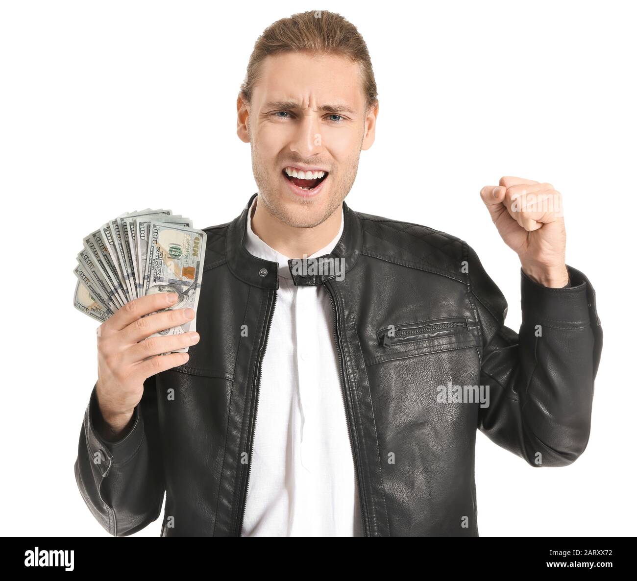 Happy young man with money on white background Stock Photo - Alamy