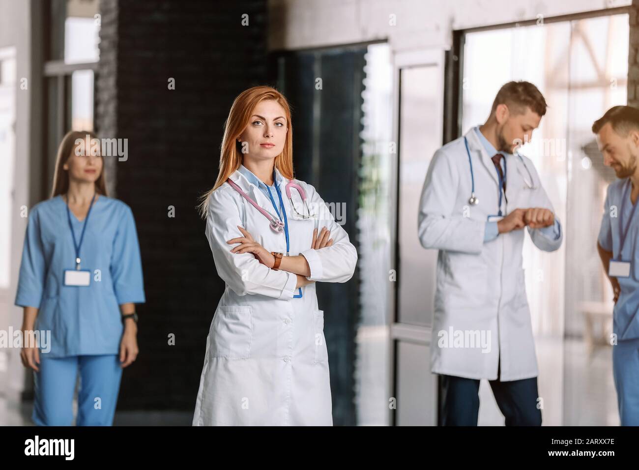 Female doctor in hall of clinic Stock Photo - Alamy