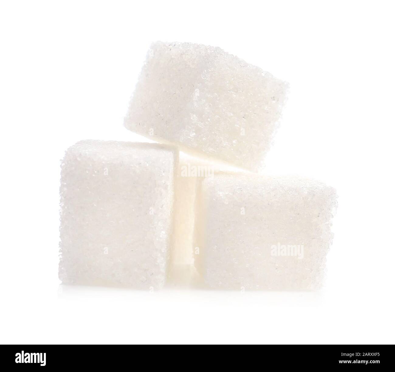 Sweet sugar cubes on white background Stock Photo - Alamy