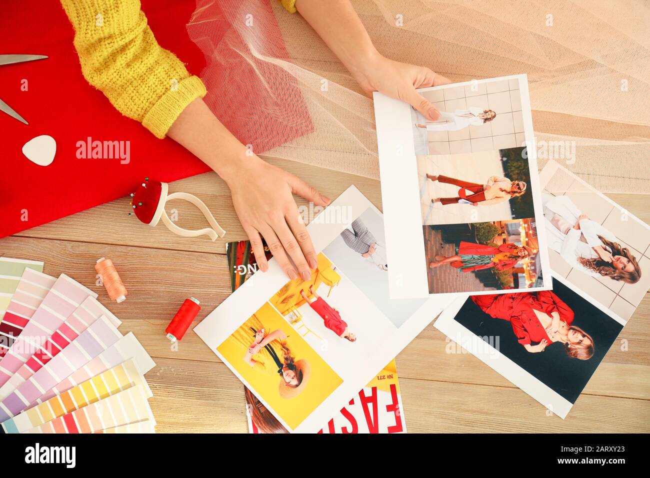 Female designer working at table, top view Stock Photo - Alamy