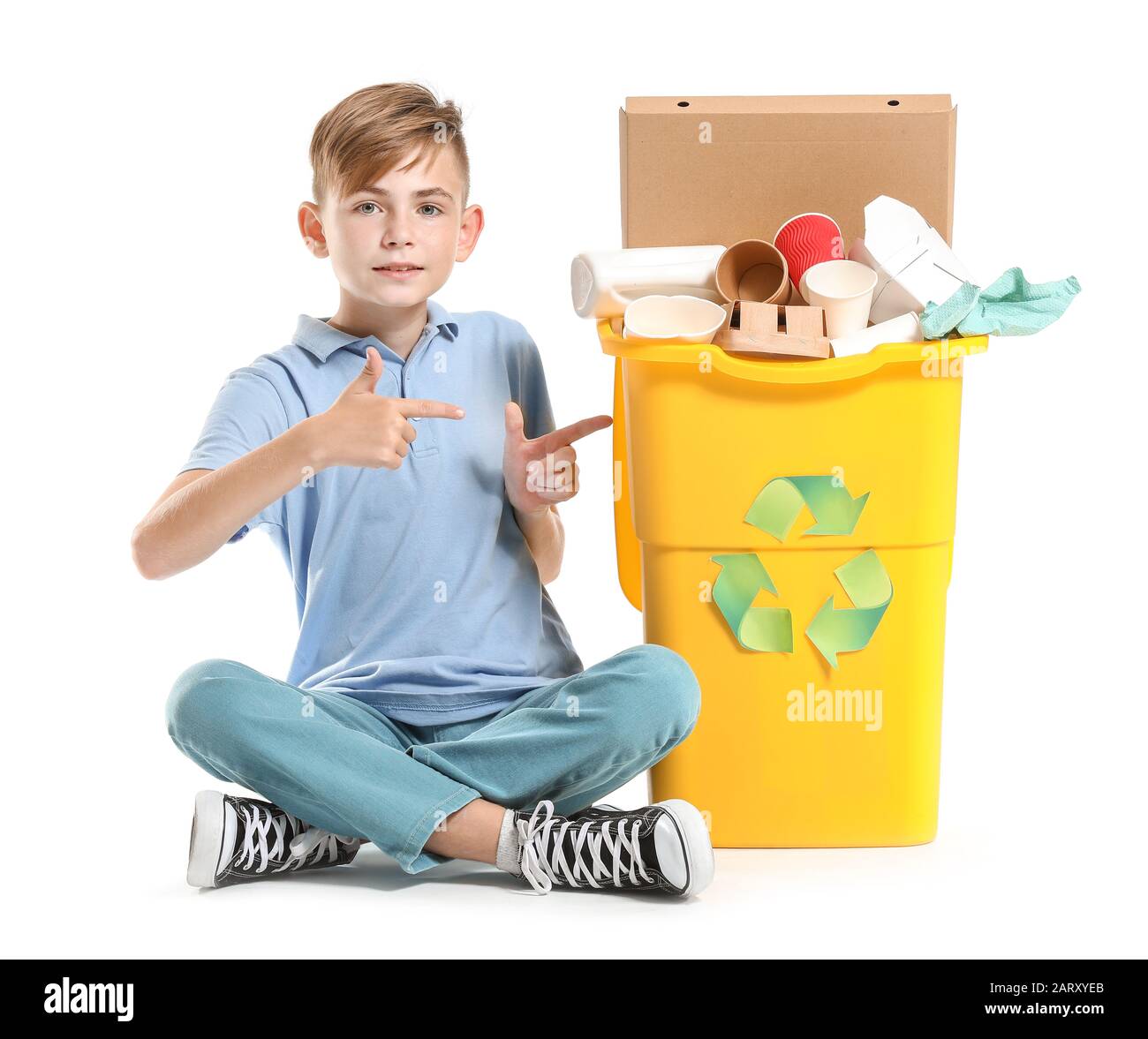 Little boy and container with trash on white background. Concept of ...