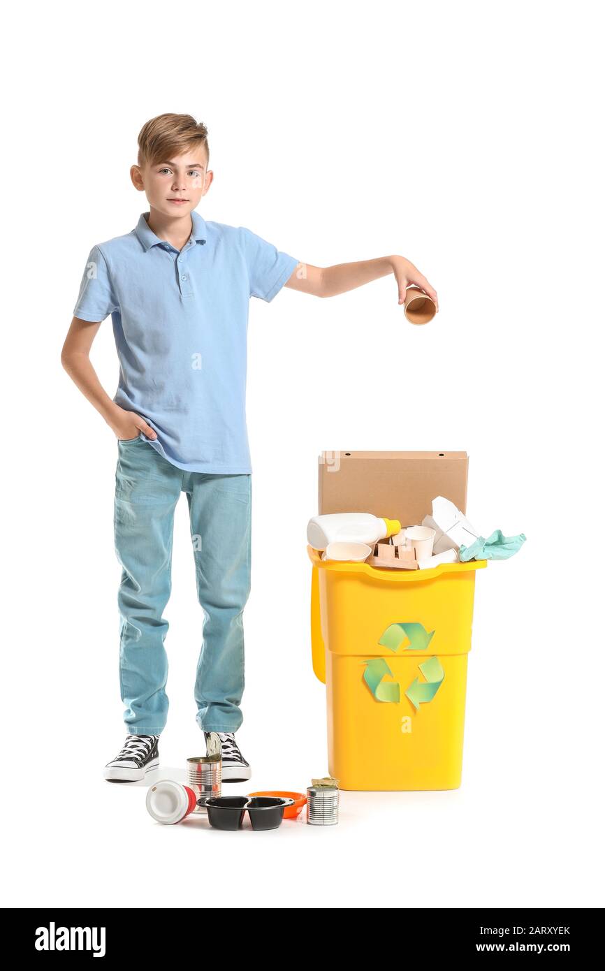 Little boy and container with trash on white background. Concept of ...