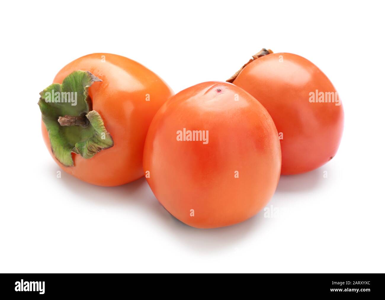 Ripe persimmons isolated on white Stock Photo - Alamy