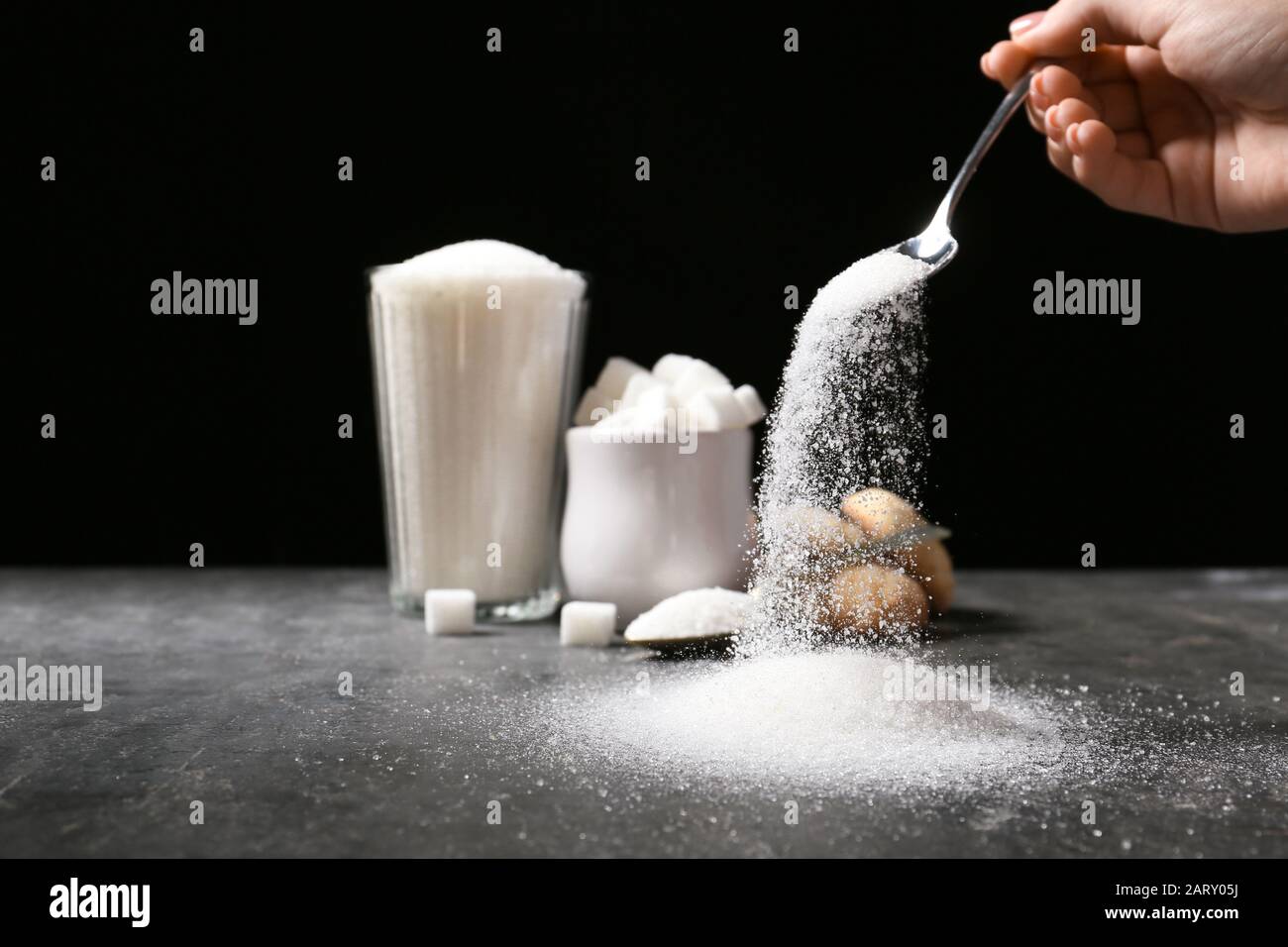 Woman pouring sweetener hi-res stock photography and images - Alamy