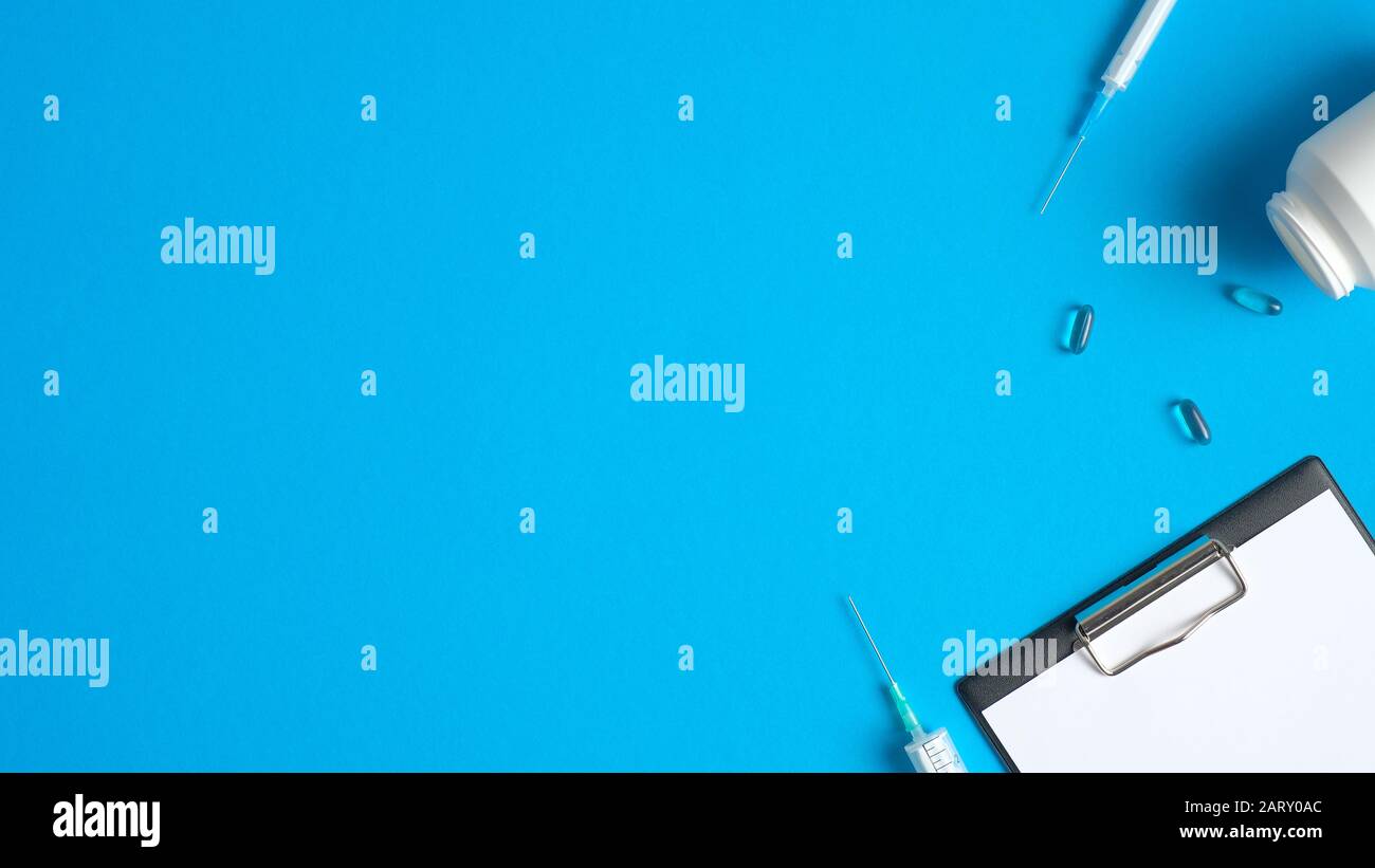 Frame border of medical tools and equipment on blue background. Top ...