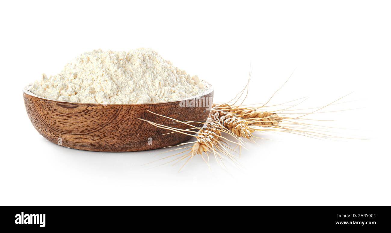 Bowl with flour on white background Stock Photo - Alamy