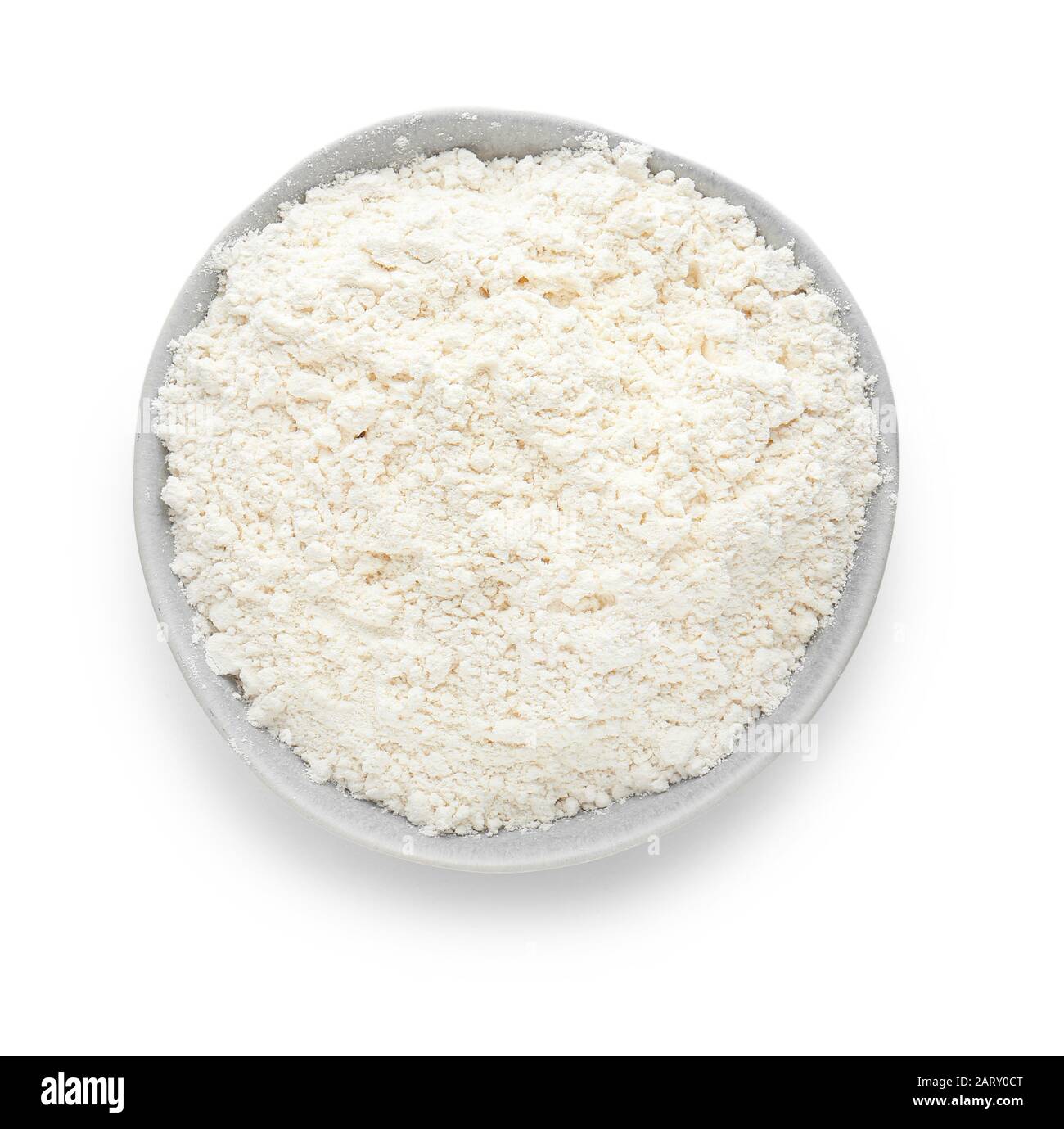Bowl with flour on white background Stock Photo - Alamy