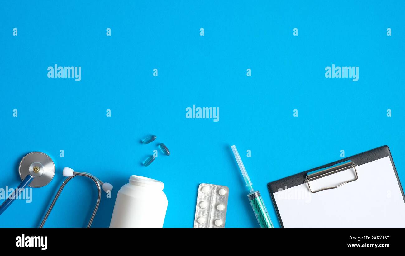 Pediatric medical equipment on blue background. Frame border of ...