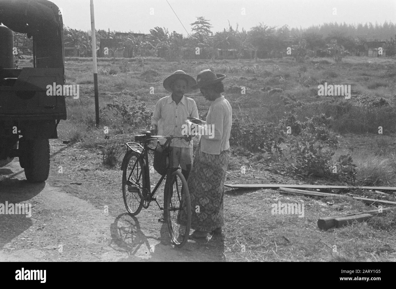 Two Indonesians, one with bicycle Date: 1946 Location: Indonesia, Dutch ...