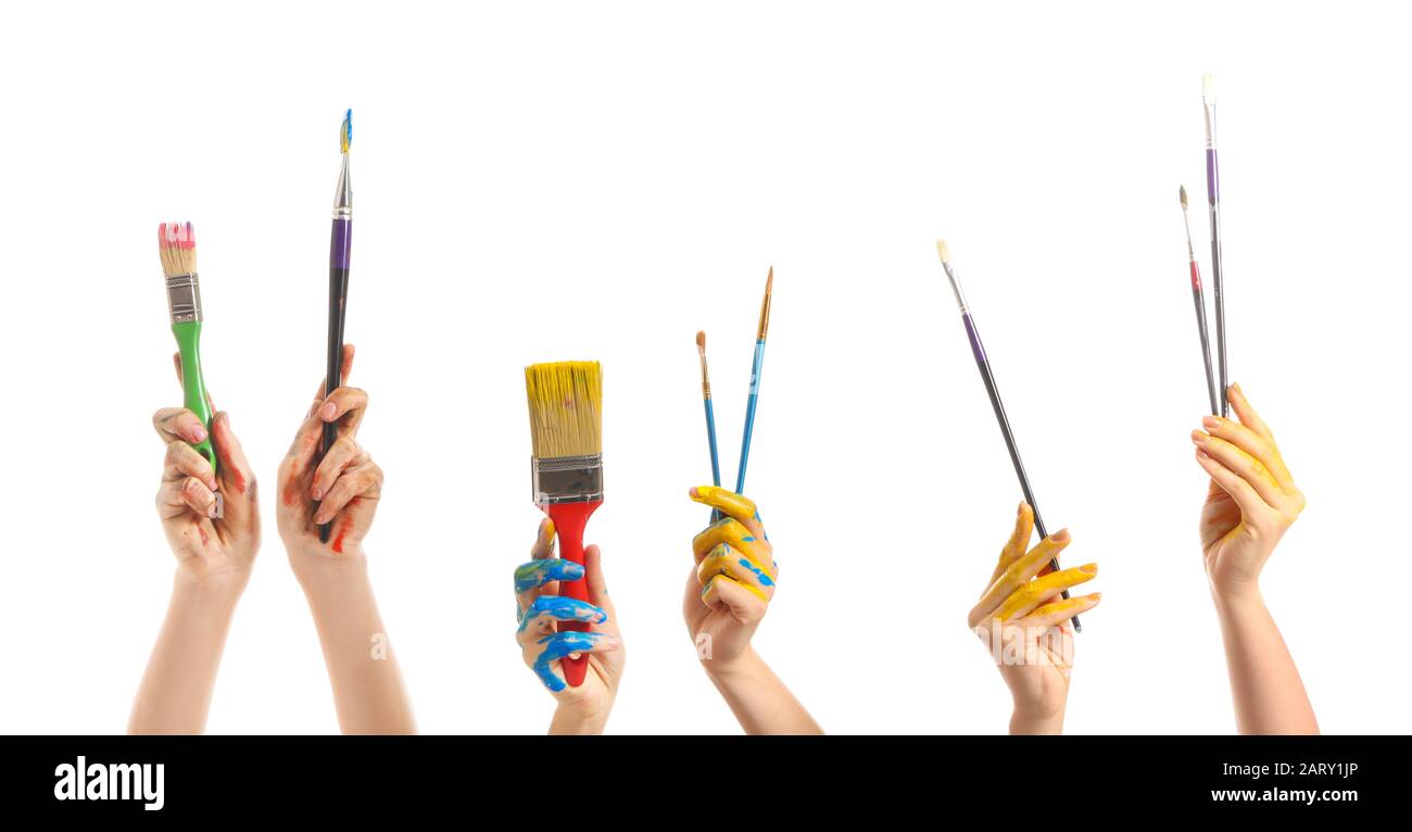 Female hands with painter's supplies on white background Stock Photo ...