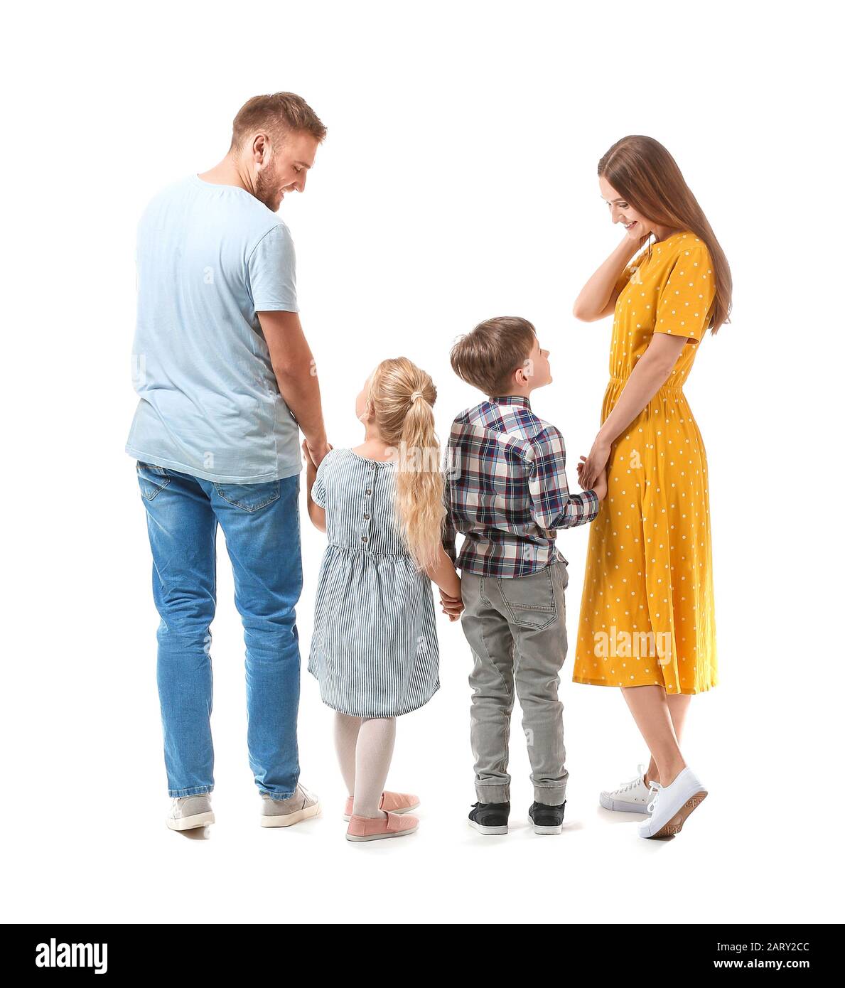 Happy family on white background, back view Stock Photo - Alamy