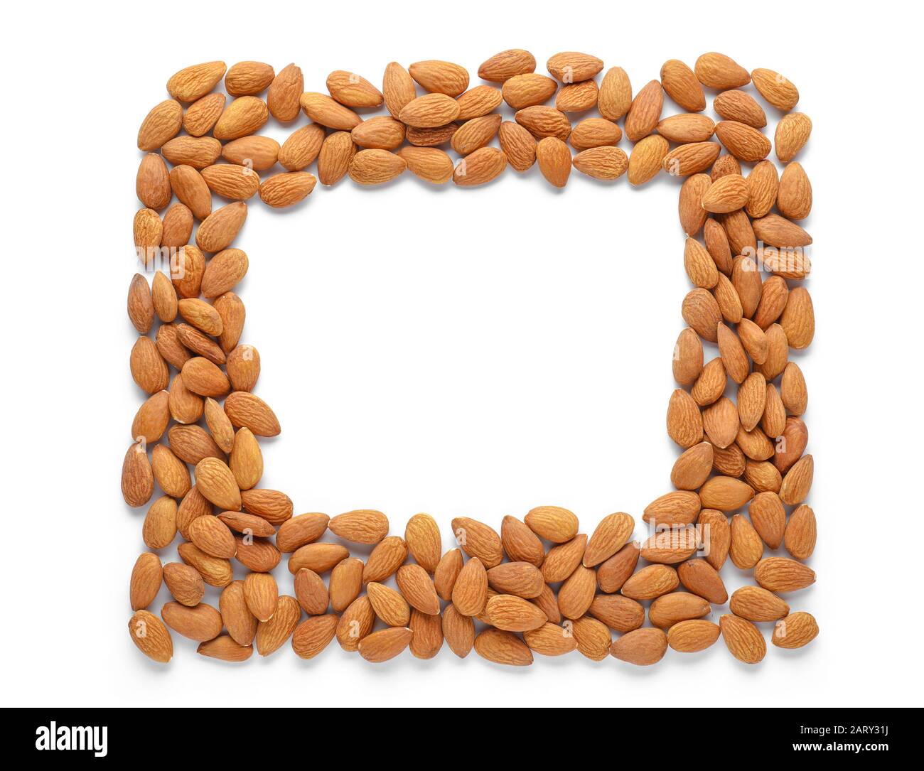 Frame made of almonds on white background Stock Photo - Alamy