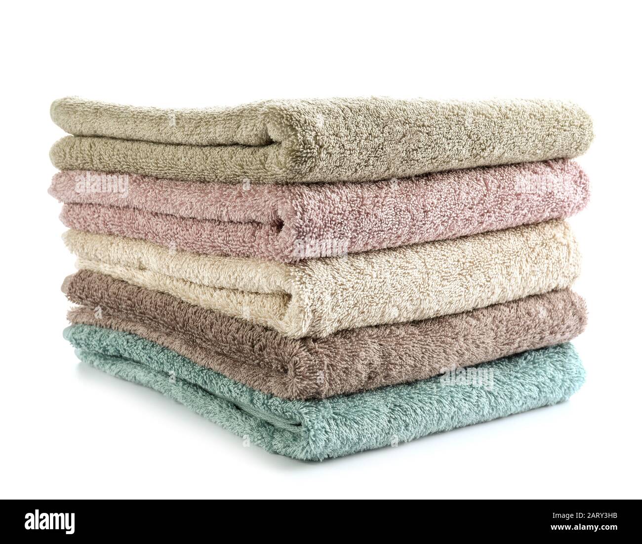Stack of clean towels on white background Stock Photo - Alamy