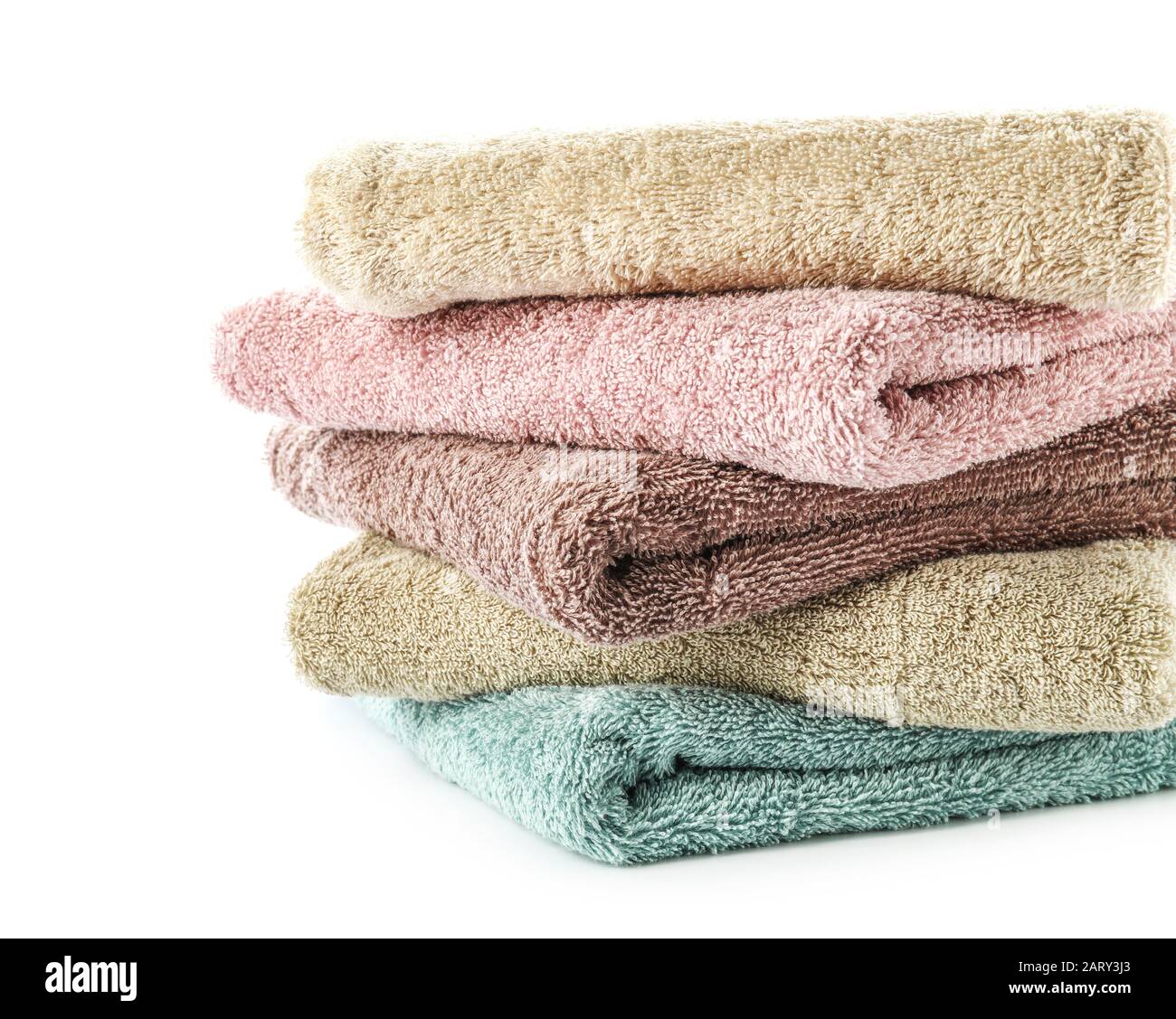 Stack of clean towels on white background Stock Photo - Alamy