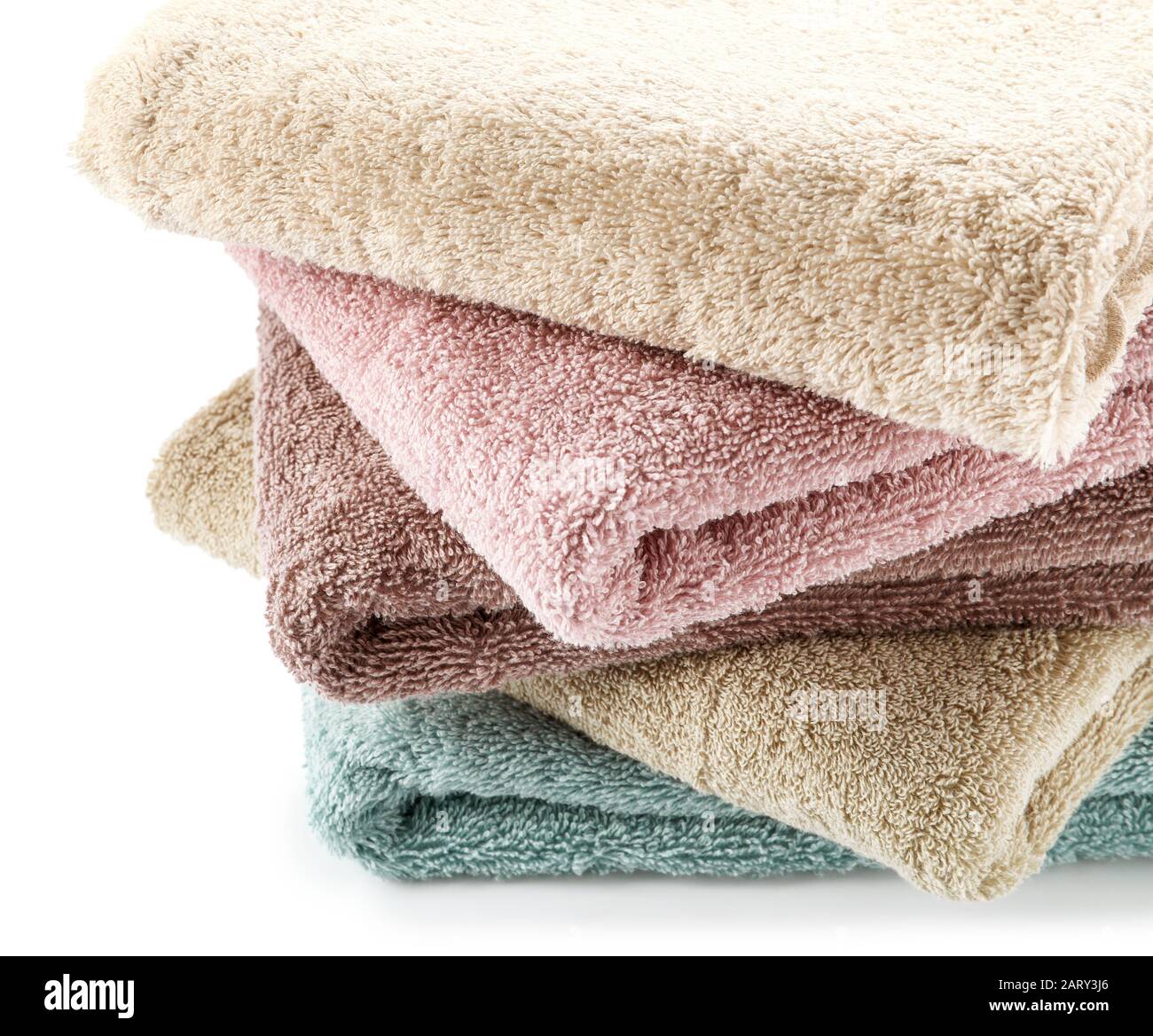 Stack of clean towels on white background Stock Photo - Alamy