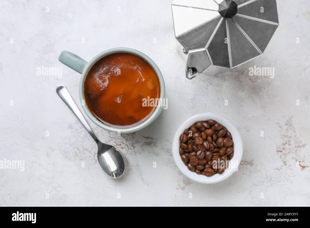 Cup of coffee with pot on white background Stock Photo - Alamy
