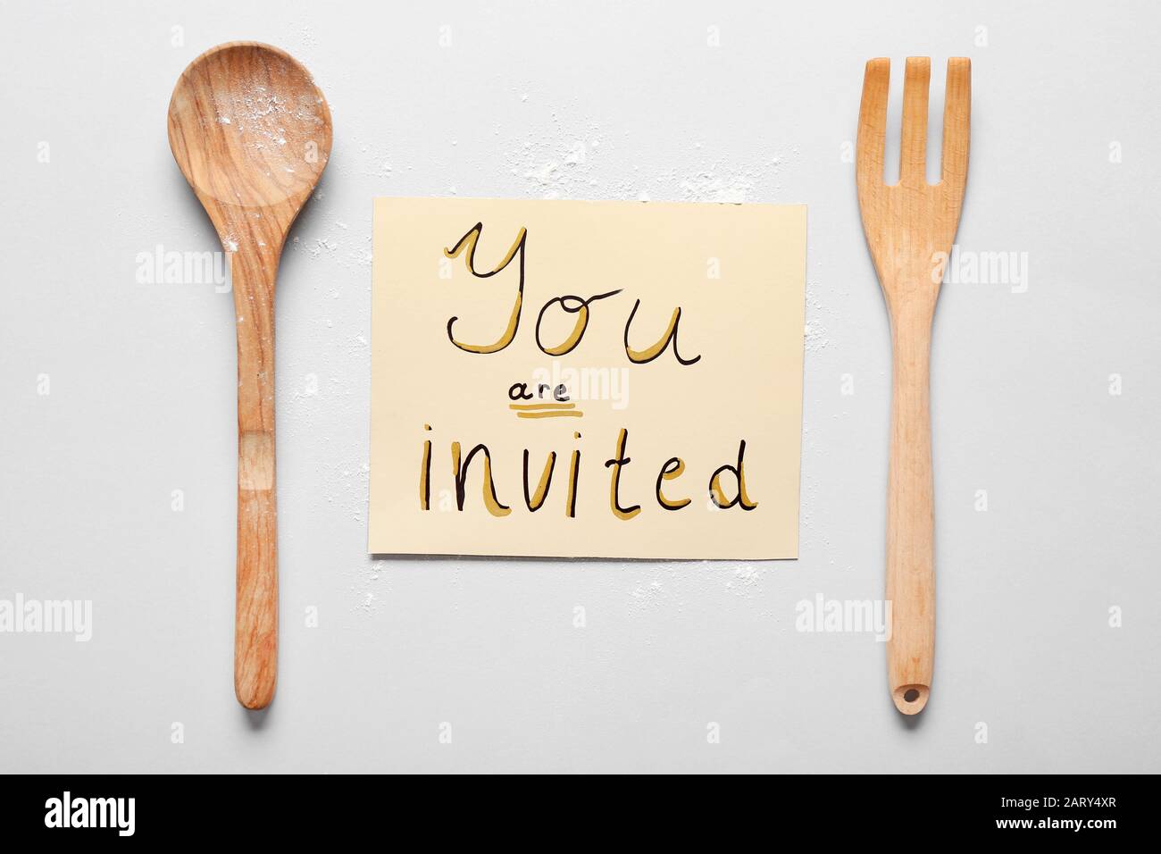 Invitation with kitchen utensils on white background Stock Photo - Alamy