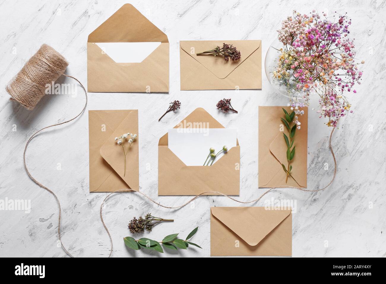 Invitations with envelopes and floral decor on white background Stock ...