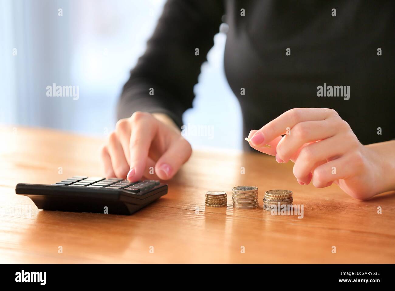 Bank counting stacks of money hi-res stock photography and images - Alamy