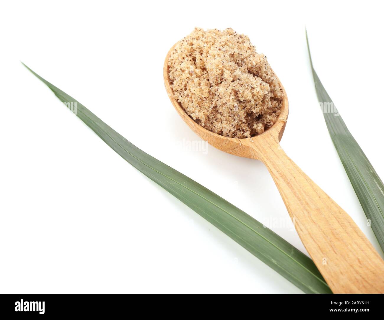 Spoon with scrub on white background Stock Photo - Alamy