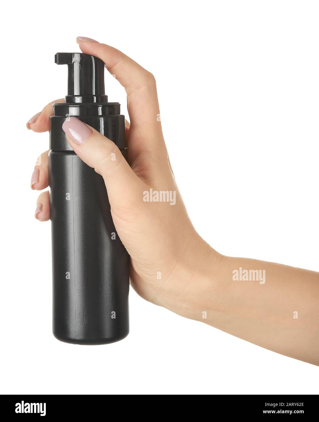 Female hand with cosmetic product in bottle on white background Stock ...