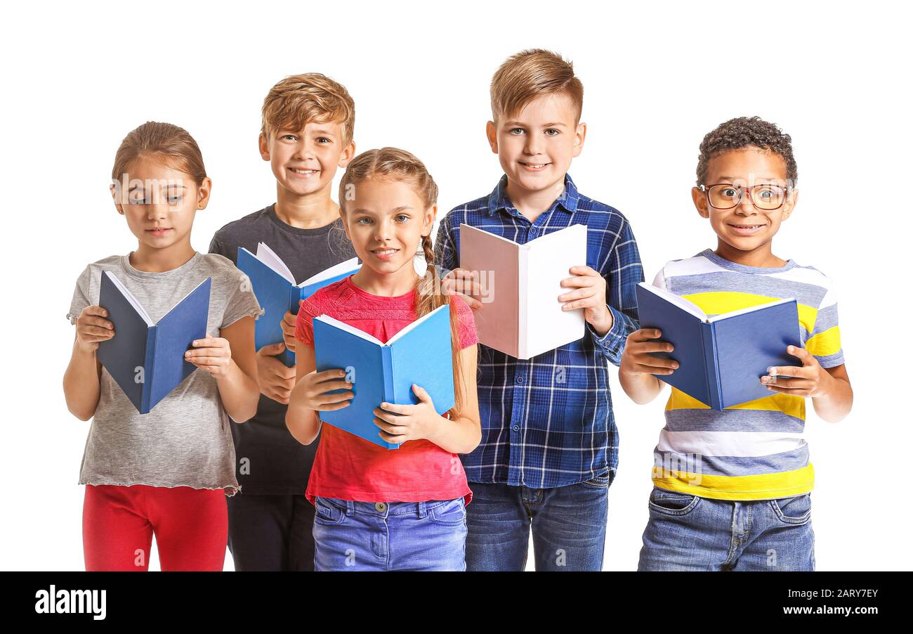 Cute little children reading books on white background Stock Photo - Alamy