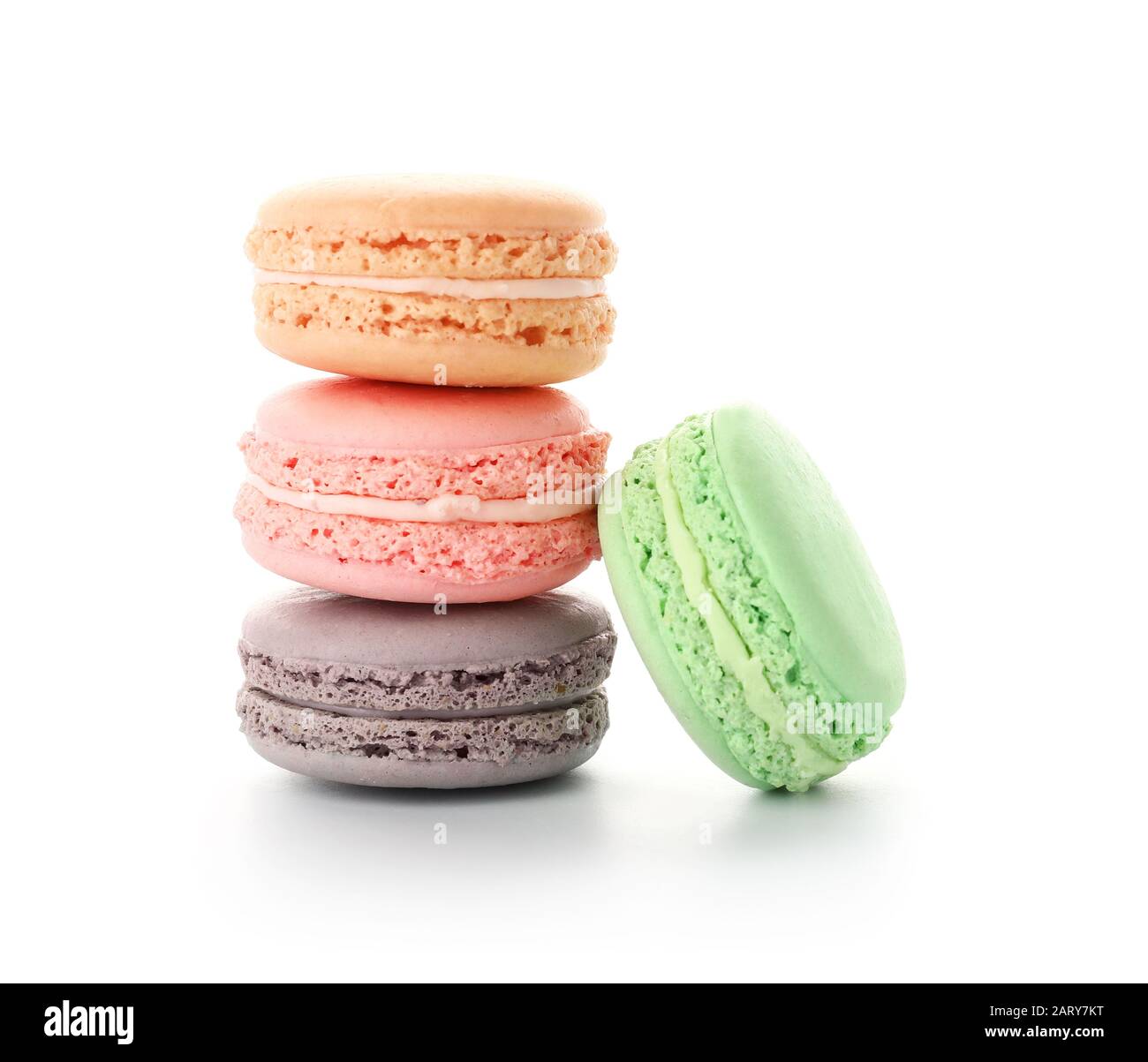 Different tasty macarons on white background Stock Photo - Alamy